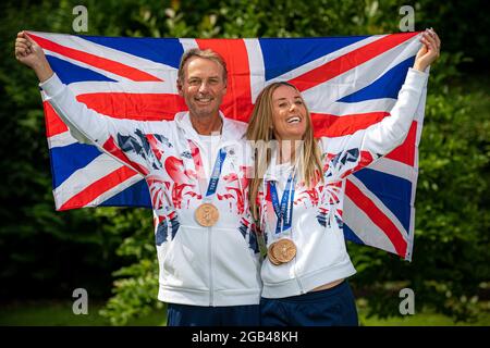 Carl Hester and Charlotte Dujardin raise the Union flag in celebration ...