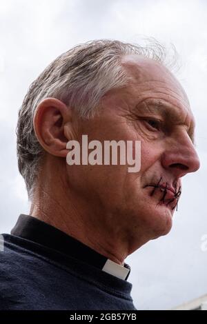 Mouth sewn together Stock Photo - Alamy