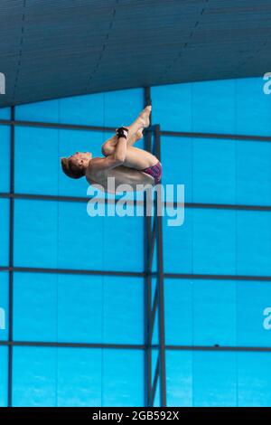 British diver Matty Lee (Matthew Lee) after dive with team member ...