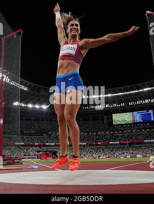 Valarie Allman of the United States reacts after her first throw in the ...