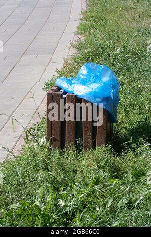 Dustbin in Park at dry sunny summer day Stock Photo - Alamy