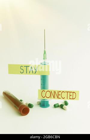 Handwriting text writing Stay Connected. Conceptual photo To keep ...