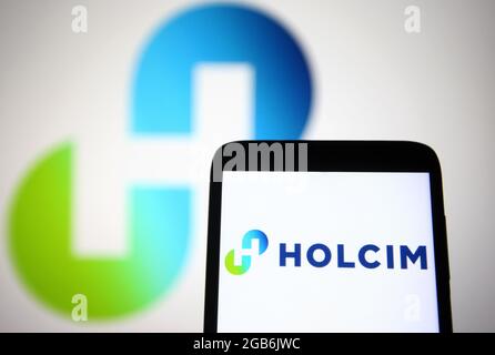 In this photo illustration a Holcim Ltd. logo seen displayed on a smart ...