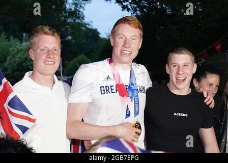 British swimmer Tom Dean at a welcome home party at his family home in ...