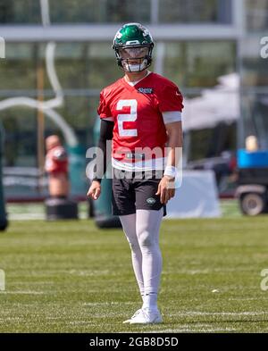 New York Jets quarterback Zach Wilson throws a pass before an NFL ...