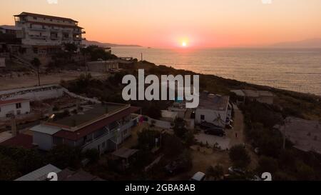 sunset on Albania beach shiny Stock Photo - Alamy