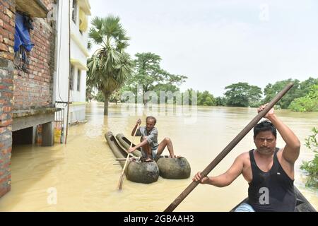 People use boat to commute in the Ghatal area of Paschim Medinipur ...