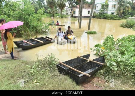 People use boat to commute in the Ghatal area of Paschim Medinipur ...