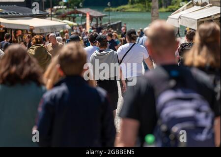 Berchtesgaden, Germany. 03rd Aug, 2021. Tourists stand at the jetty of ...