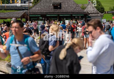 Berchtesgaden, Germany. 03rd Aug, 2021. Tourists stand at the jetty of ...
