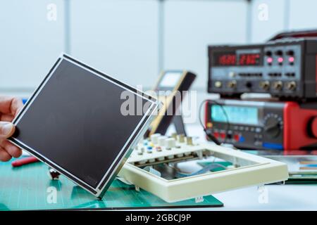 Repair of computer parts in a customer service laboratory Stock Photo ...