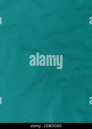 Turquoise jersey fabric matte texture top view. Blue knitwear ...