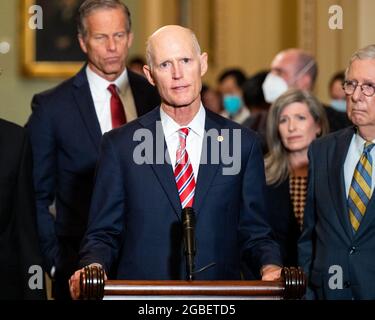 Senator Rick Scott (R-FL) speaks with visitors at the U.S. Capitol, in ...