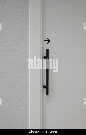 Vertical shot of the closed white door of a building Stock Photo - Alamy