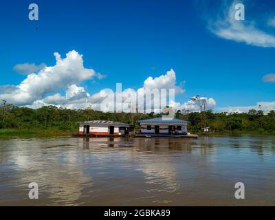 Riverfront town along the Amazon River, showing the custom and life of ...