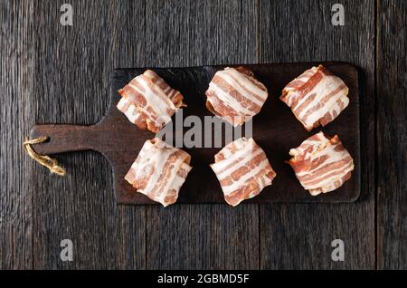 raw english meatballs, uncooked faggots are made of minced offal and ...