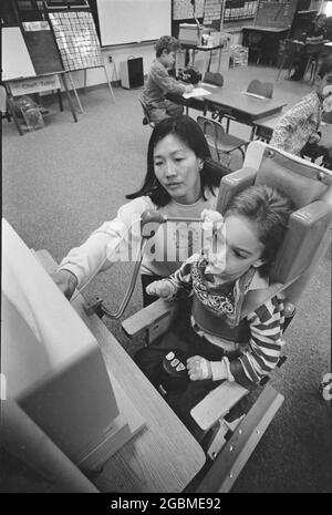 Austin Texas USA, 1990: Kindergarten teacher in bilingual class ...