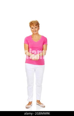 Full body shot of happy mature woman in bikini ready for vacation Stock ...