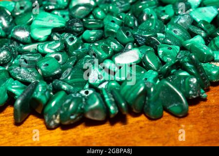 Freeform gravel beads of natural green malachite stone Stock Photo - Alamy