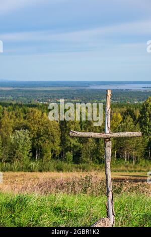 Wooden cross on autumn slope Stock Photo - Alamy
