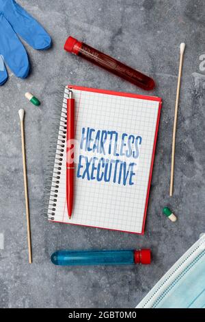 Text sign showing Heartless Executive. Business photo showcasing ...
