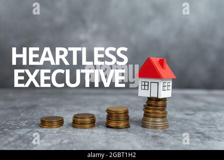 Handwriting text Heartless Executive. Business idea workmate showing a ...