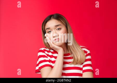 Close-up tired girl express apathy boredom, sighing reluctant look ...