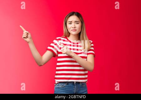 Whining displeased blond asian disappointed girl frowning hesitant ...