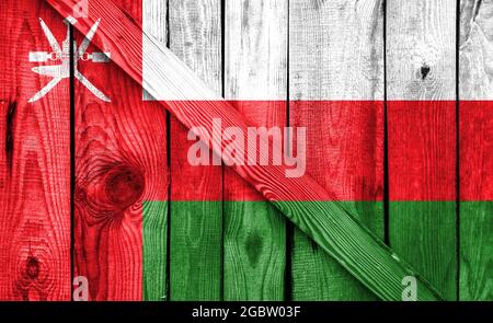 Oman flag depicted on many leafs of monstera palm trees. Trendy ...