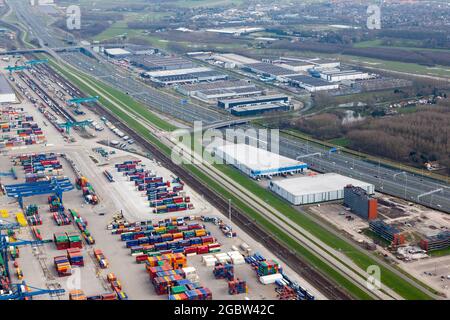 modern blue warehouse in the Rotterdam harbor area Stock Photo - Alamy