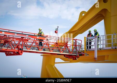 The 'walk to work' gantry of the Esvagt Alba in the Moray Offshore ...