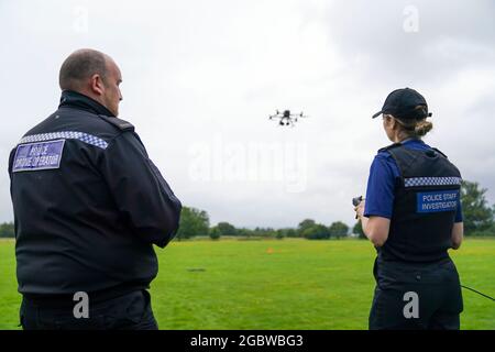 Police officers fly drones during the Thames Valley Police's first ...