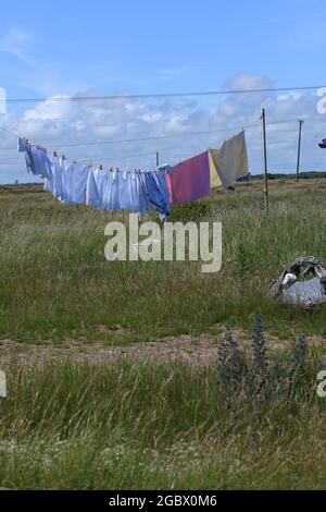 washing line full of washing in public at Lochcarron, Loch Carron ...