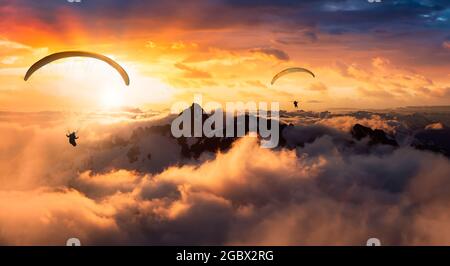 Adventure Composite Image of Paraglider Flying up high in the Rocky ...