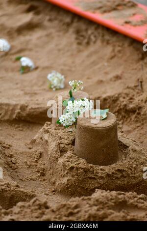 Empty Children's sandbox with a crafts and flowers, Russia Stock Photo ...