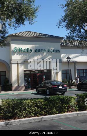 O'Reilly Auto Parts storefront in a shopping complex. Tariffs imposed ...