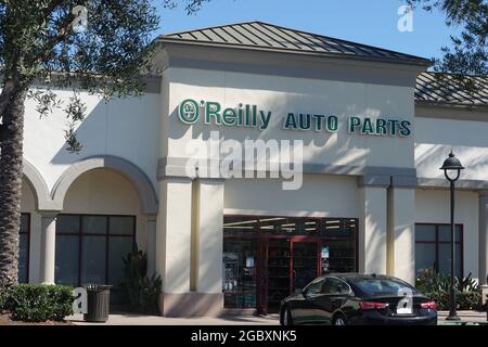 O'Reilly Auto Parts storefront in a shopping complex. Tariffs imposed ...