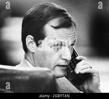 Austin Texas USA, 1989: Texas State Rep. JIM RUDD puts his feet up on ...