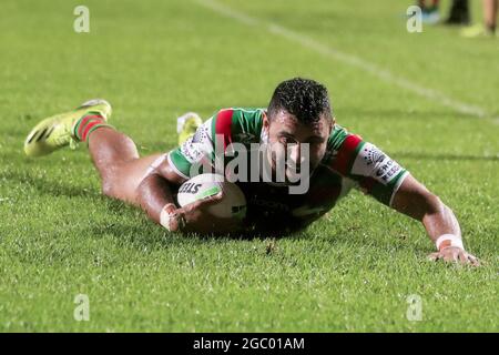 Alex Johnston of the Rabbitohs scores a try during the Round 1 NRL ...