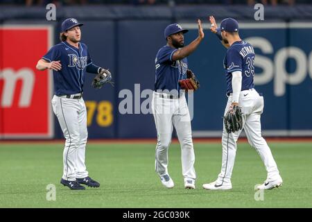 Seattle Mariners outfielders Randy Arozarena, left, Victor Robles ...