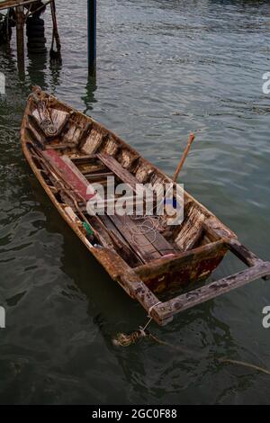 Wooden rotten rowboat in Penang, Malaysia Stock Photo - Alamy