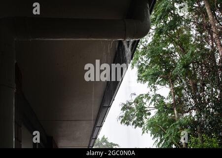 Heavy rain overflowing gutters Stock Photo - Alamy