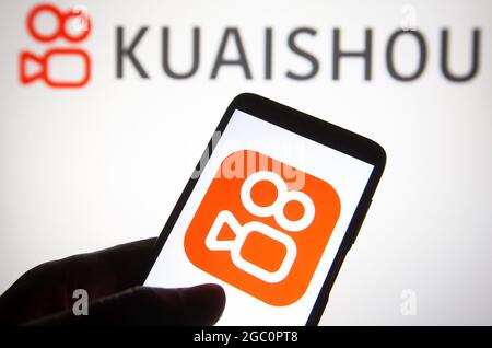 In this photo illustration, the Kuaishou logo seen displayed on a ...