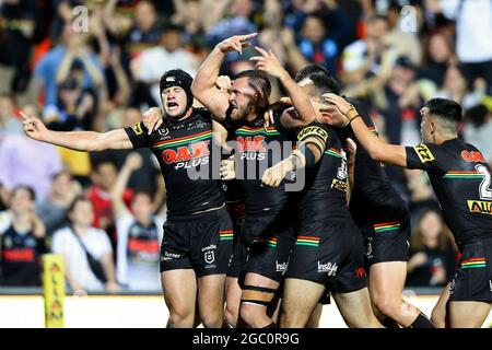 Melbourne Storm players celebrate winning the NRL Round 13 match ...