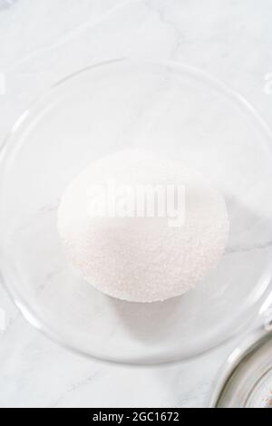 Measured ingredients in glass bowls to prepare mermaid cakesicles Stock ...