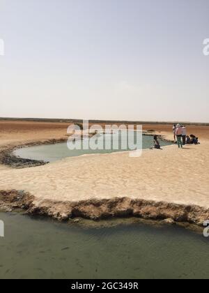 DAKHLA, MOROCCO - Jul 09, 2019: A family having a relaxing time at the ...