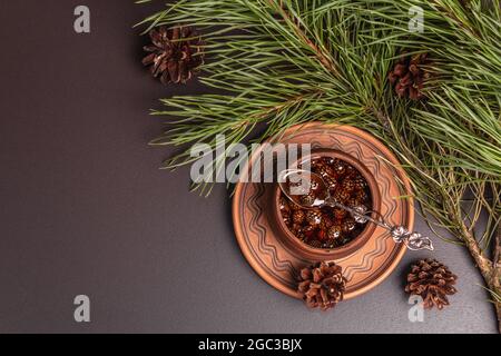 Sweet pine cone jam. Traditional Siberian dessert, fresh evergreen ...