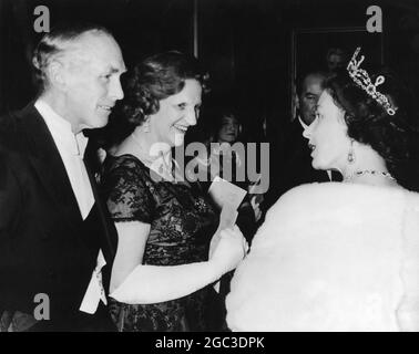 Queen Elizabeth II meets Sir Bobby Charlton CBE and his wife Lady ...