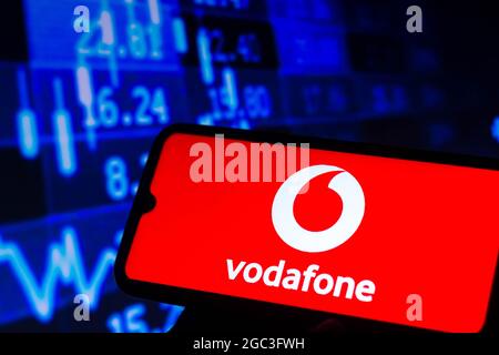 In this photo illustration, the Vodafone logo is seen displayed on a ...