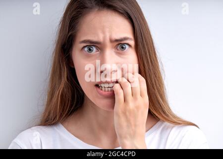 Portrait of young emotional sad dissatisfied attractive blonde woman ...